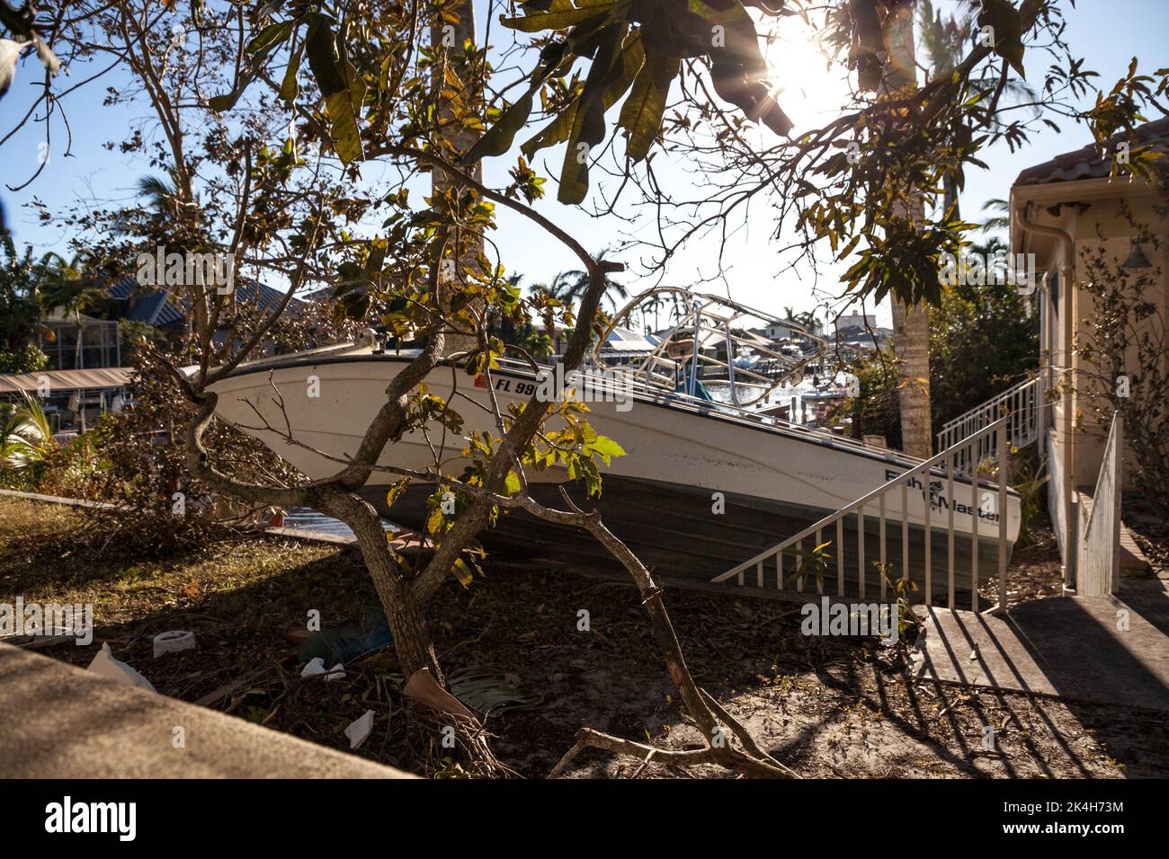 Naples, Florida, USA - September 28, 2022: NEWS –Boat pushed on land ...