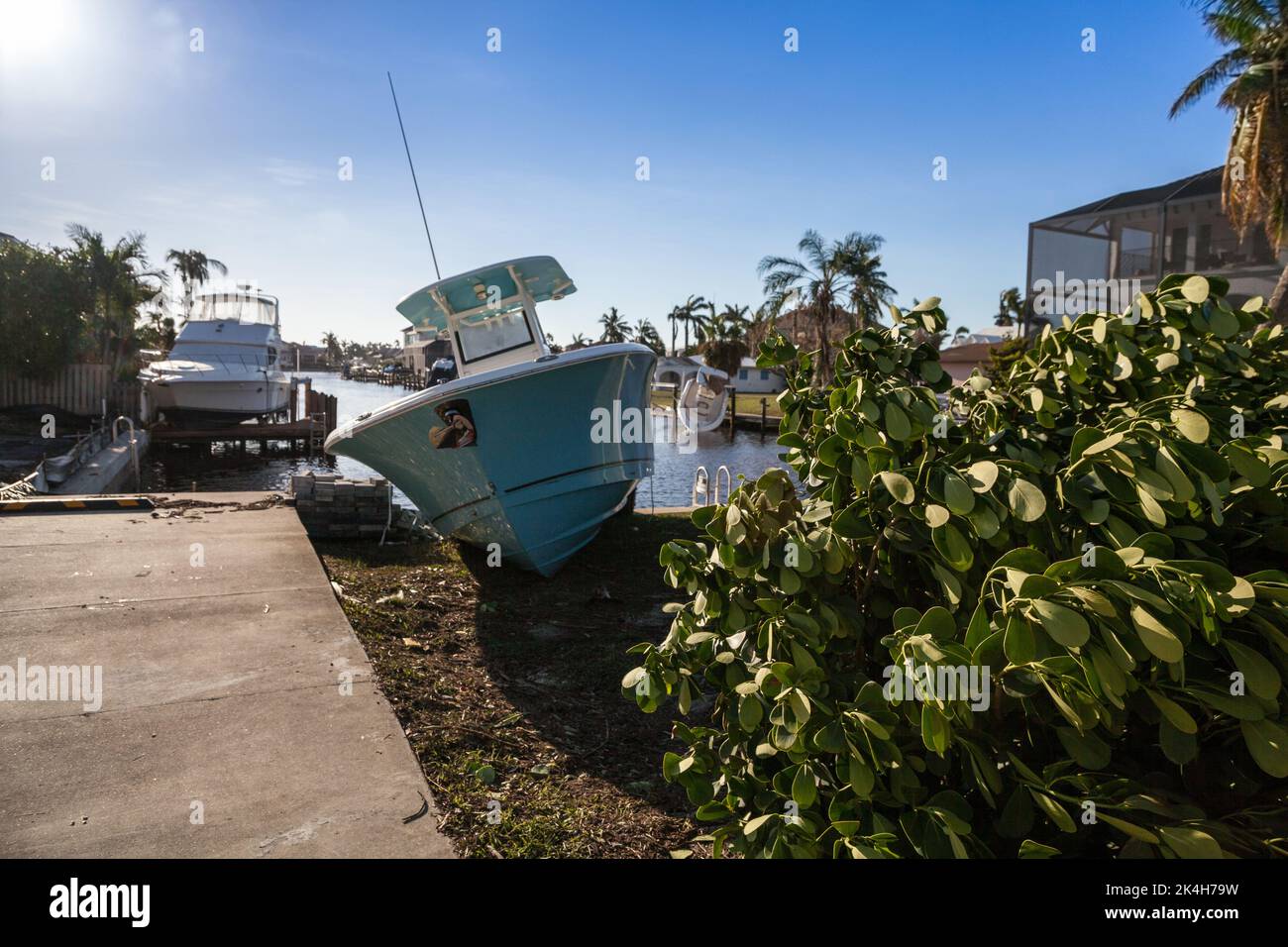 Naples, Florida, USA - September 28, 2022: NEWS –Boat pushed on land ...