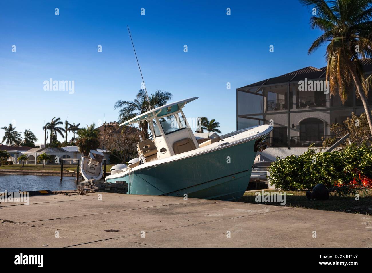 Naples, Florida, USA - September 28, 2022: NEWS –Boat pushed on land ...