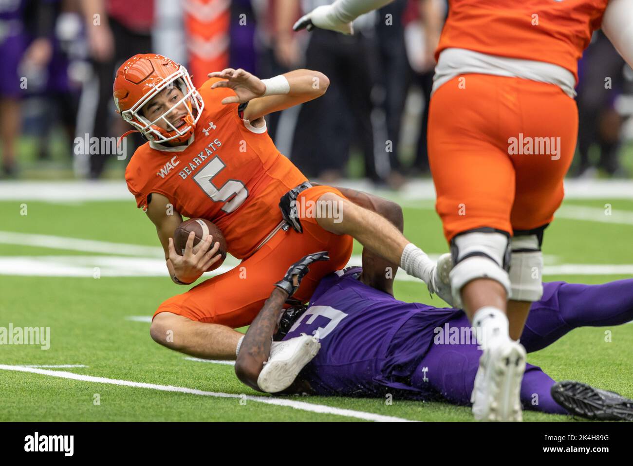 Sam Houston State Bearkats quarterback Keegan Shoemaker (5) is sacked ...