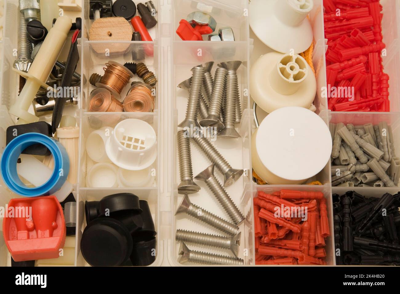Stored objects in a plastic organizer box Stock Photo - Alamy