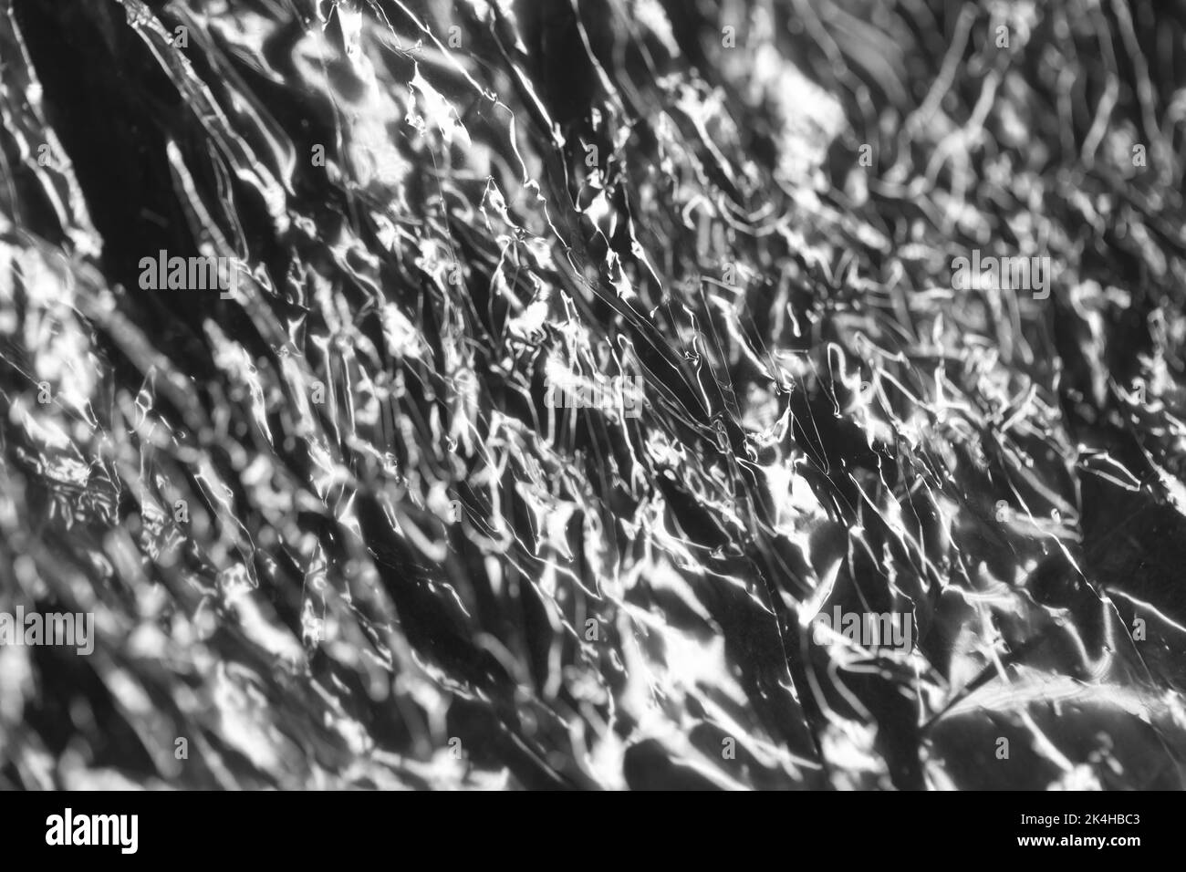 Abstracted shapes of reflecting light and shadow on creases and folds ...