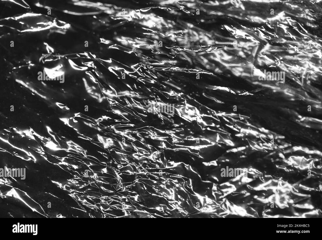 Abstracted shapes of reflecting light and shadow on creases and folds ...