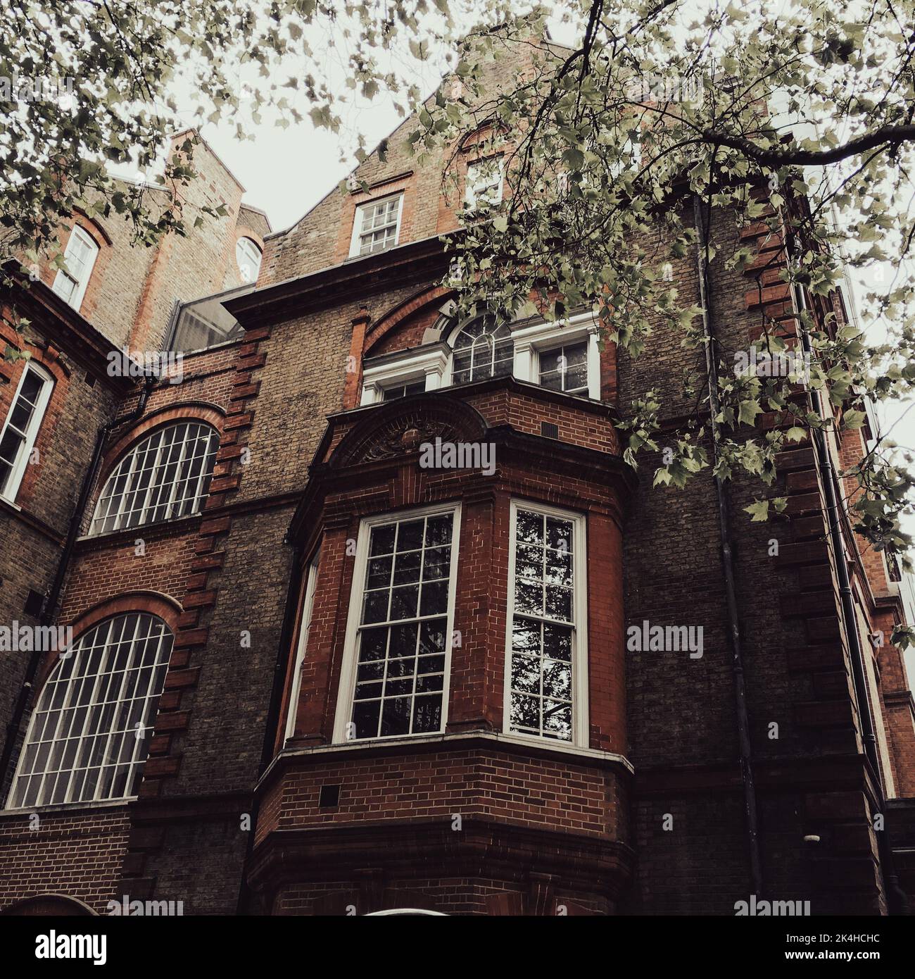 Old building in London UK with front porch window sticking out from the ...