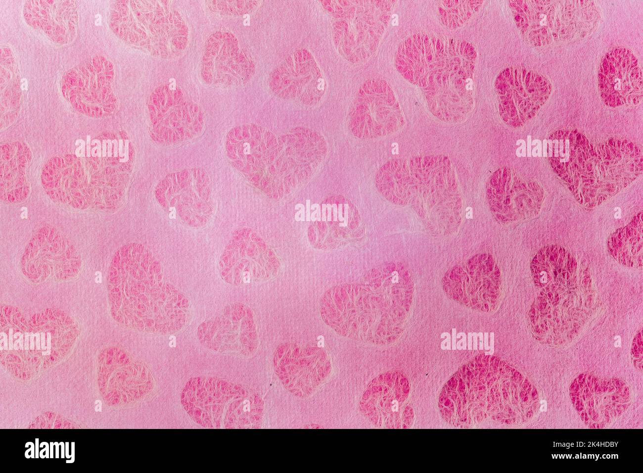 Abstract illustration of multiple hearts shapes on pink background ...