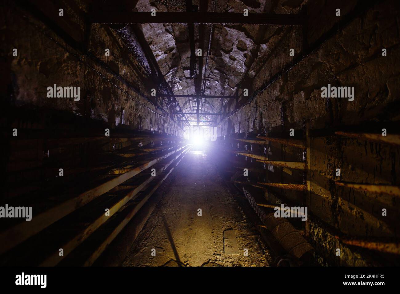 Electrical cables in the underground technical tunnel Stock Photo - Alamy