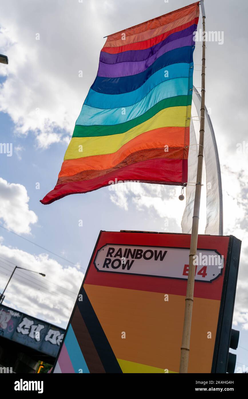 London, UK. 02nd Oct, 2022. The road sign for Rainbow Row and pride flag fly high during the ...