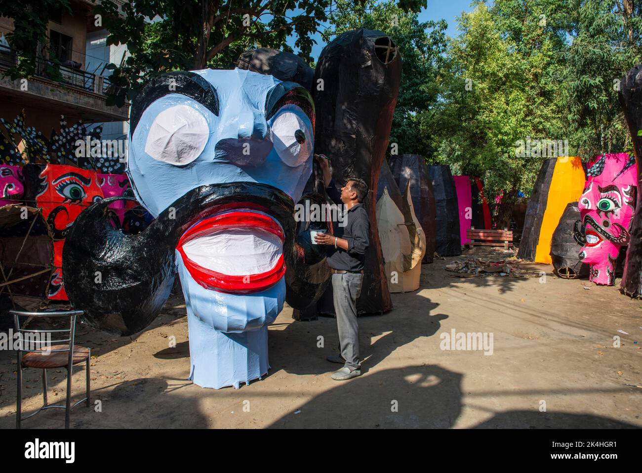 Artist prepares effigy demon king hi-res stock photography and images ...
