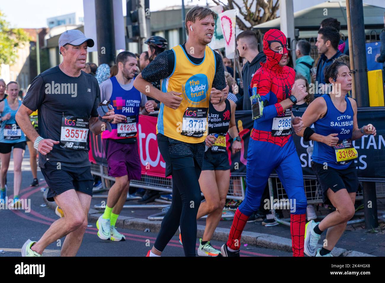 Runners including one in a spider costume are seen during the London ...