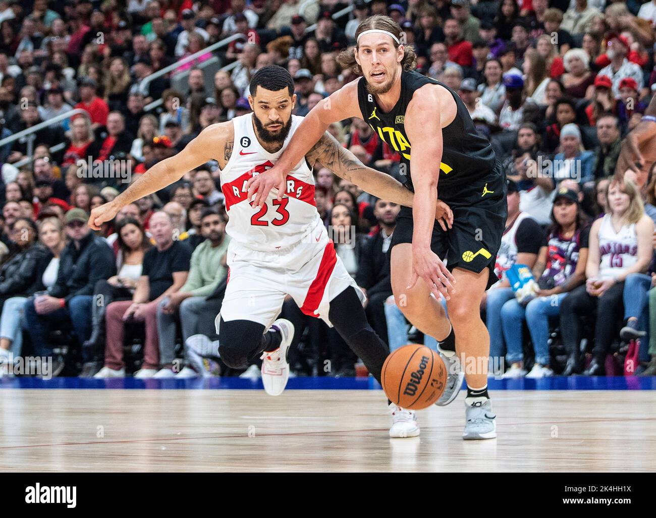 Utah Jazz's Kelly Olynyk (41) gets around Toronto Raptors' Fred ...