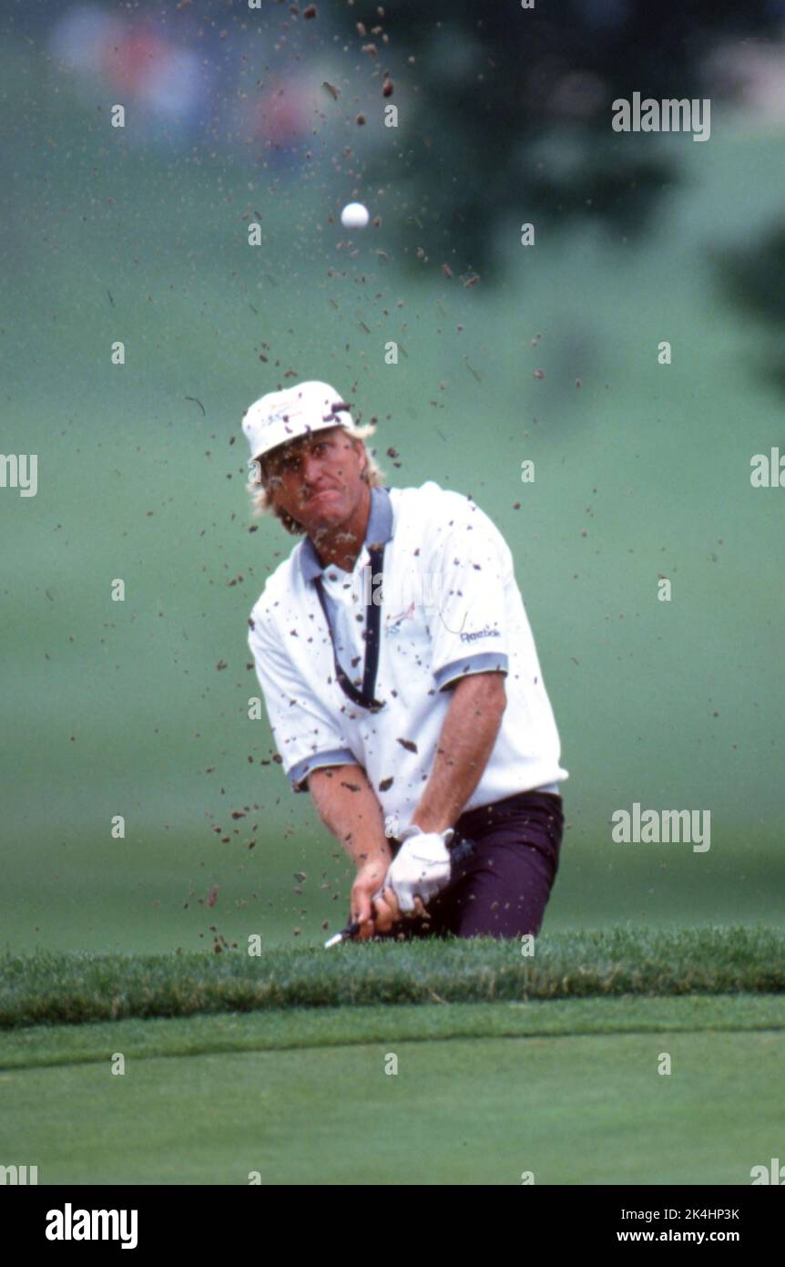 Professional golfer Greg Norman is shown playing in the Western Open in ...