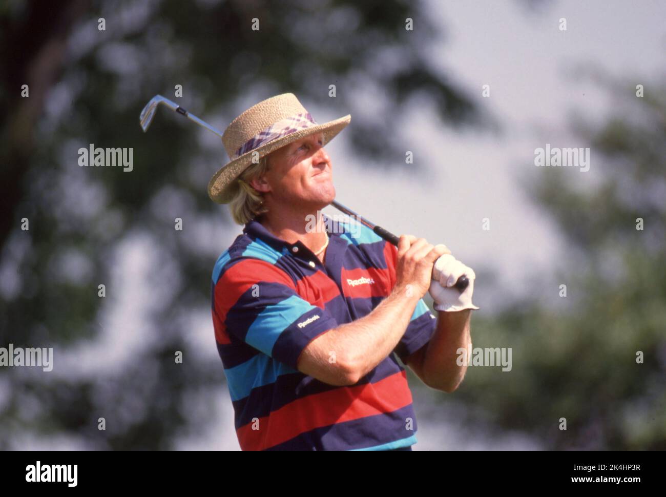 Professional golfer Greg Norman is shown playing in the Western Open in ...