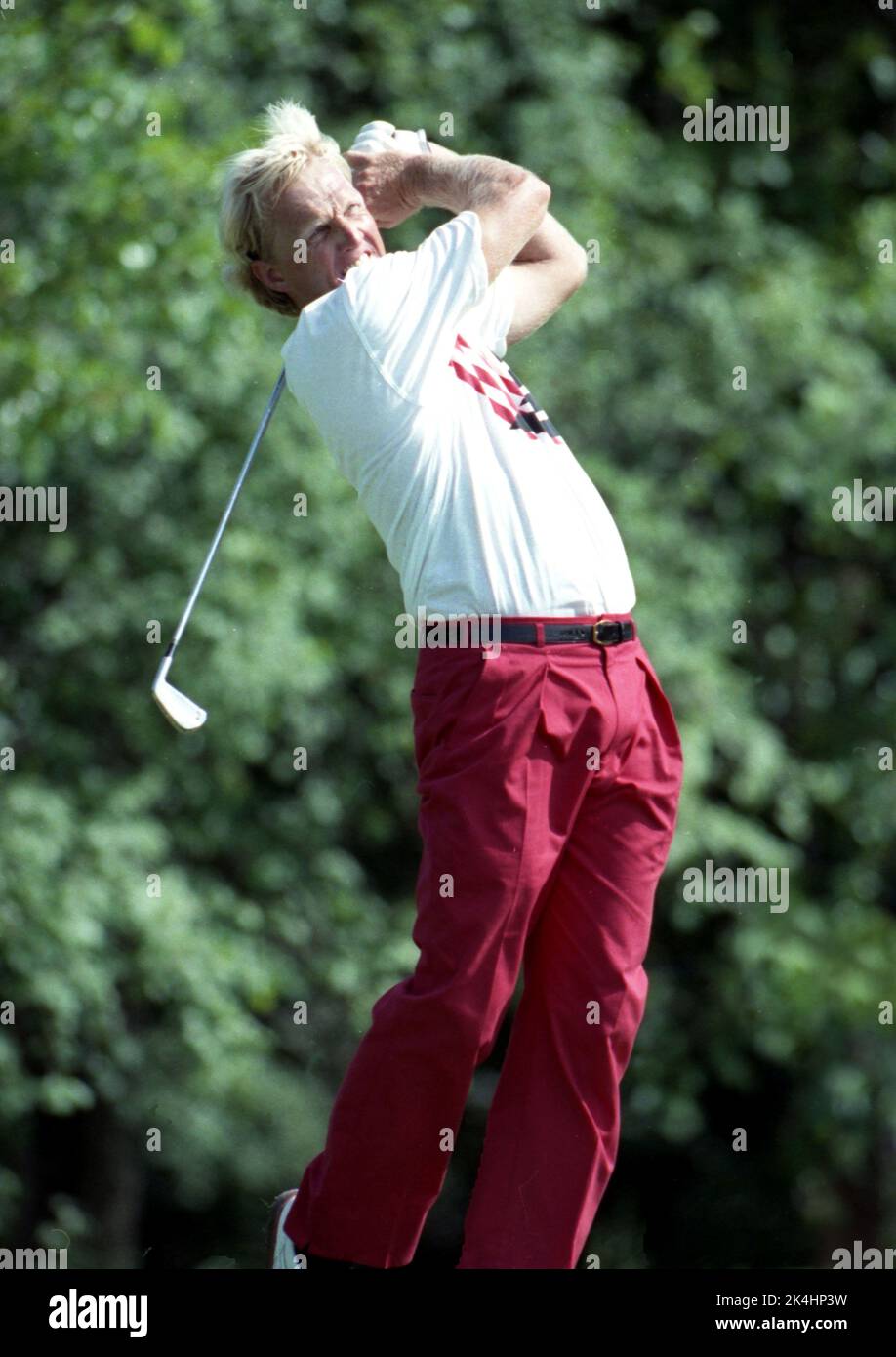 Professional golfer Greg Norman is shown playing in the Western Open in ...