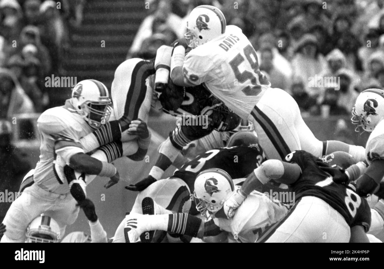 Chicago Bears running back dives for a couple yards during game action ...