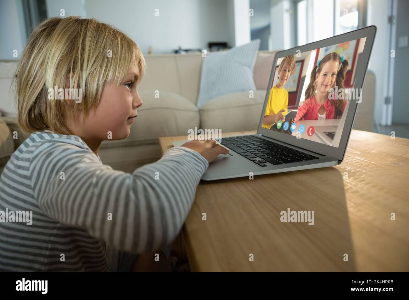 Caucasian boy using laptop for video call, with smiling caucasian ...