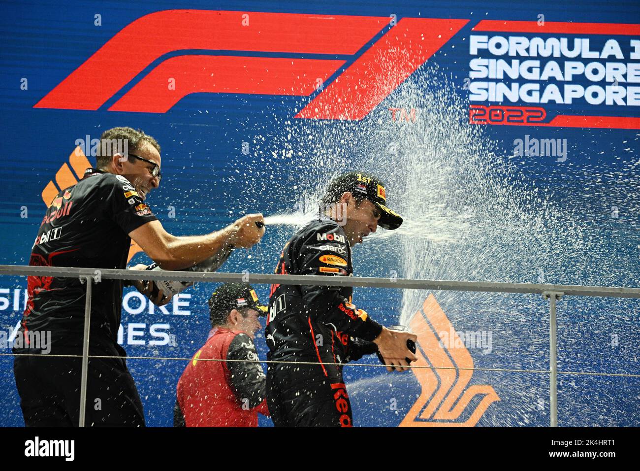 Singapore. 2nd Oct, 2022. Red Bull's Mexican driver Sergio Perez (R ...