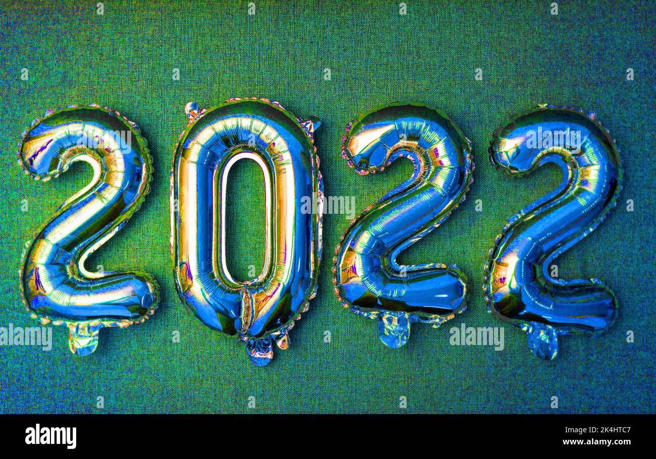 new year 2022 shiny silver balloons on colourful background Stock Photo ...