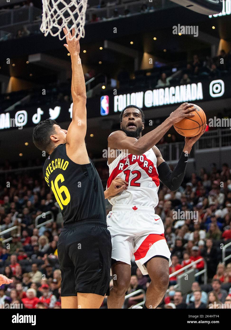 Utah Jazz's Simone Fontecchio (16) tries to stop Toronto Raptors' Josh ...
