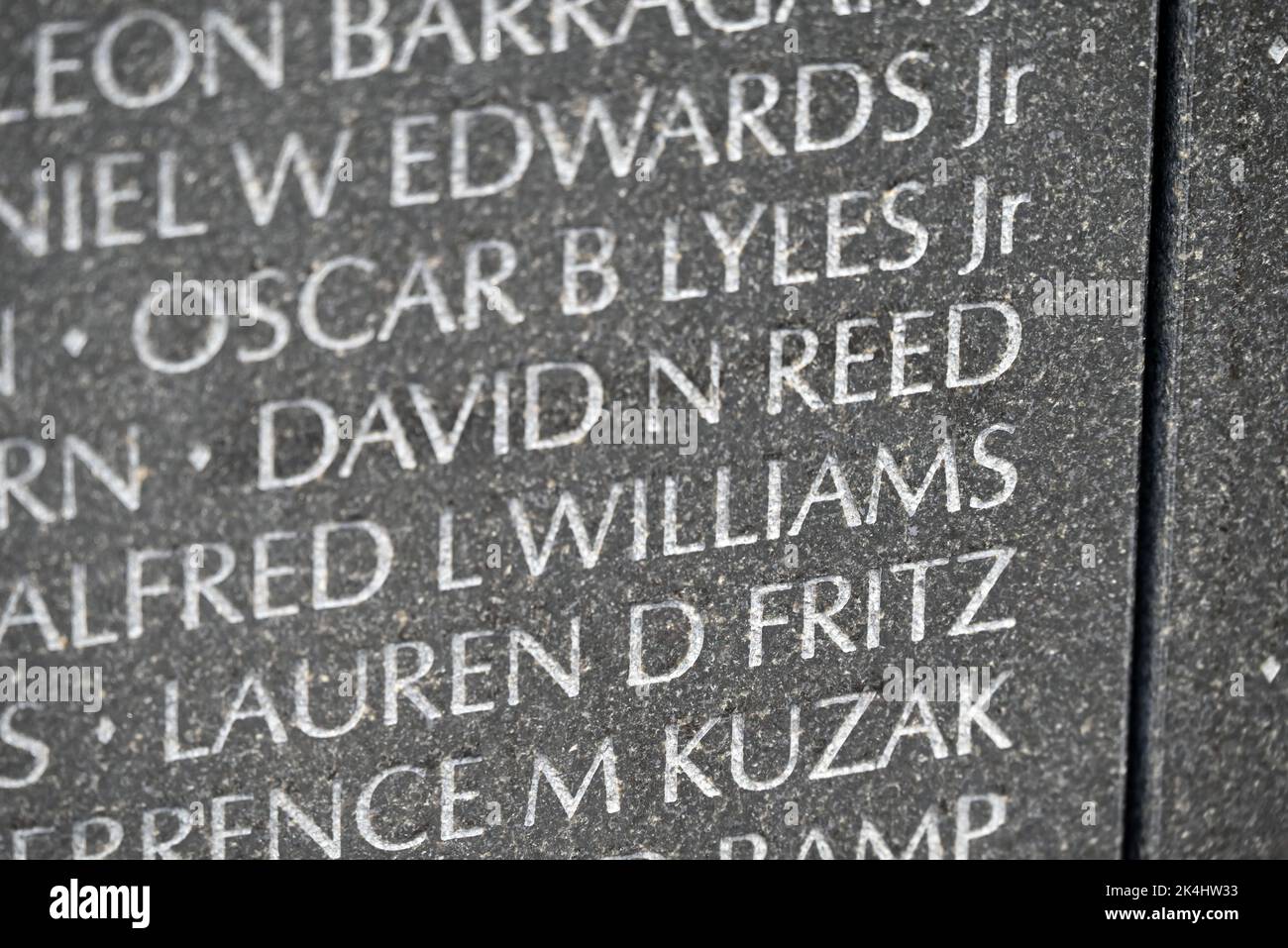 Close up of then name David Neal Reed etched on the Vietnam Memorial ...