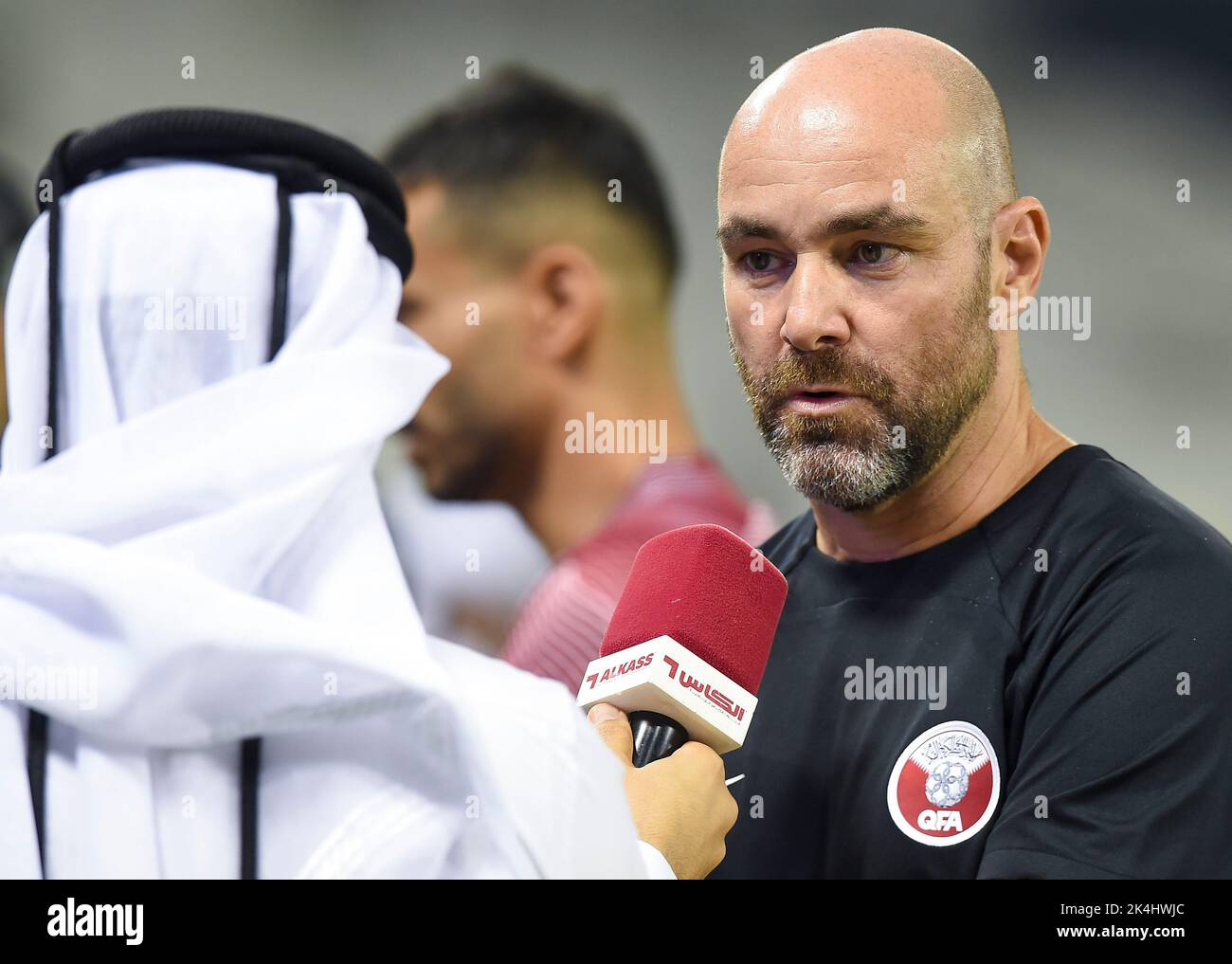 Doha, Qatar. 2nd Oct, 2022. Qatar's Spanish head coach Felix Sanchez (R ...