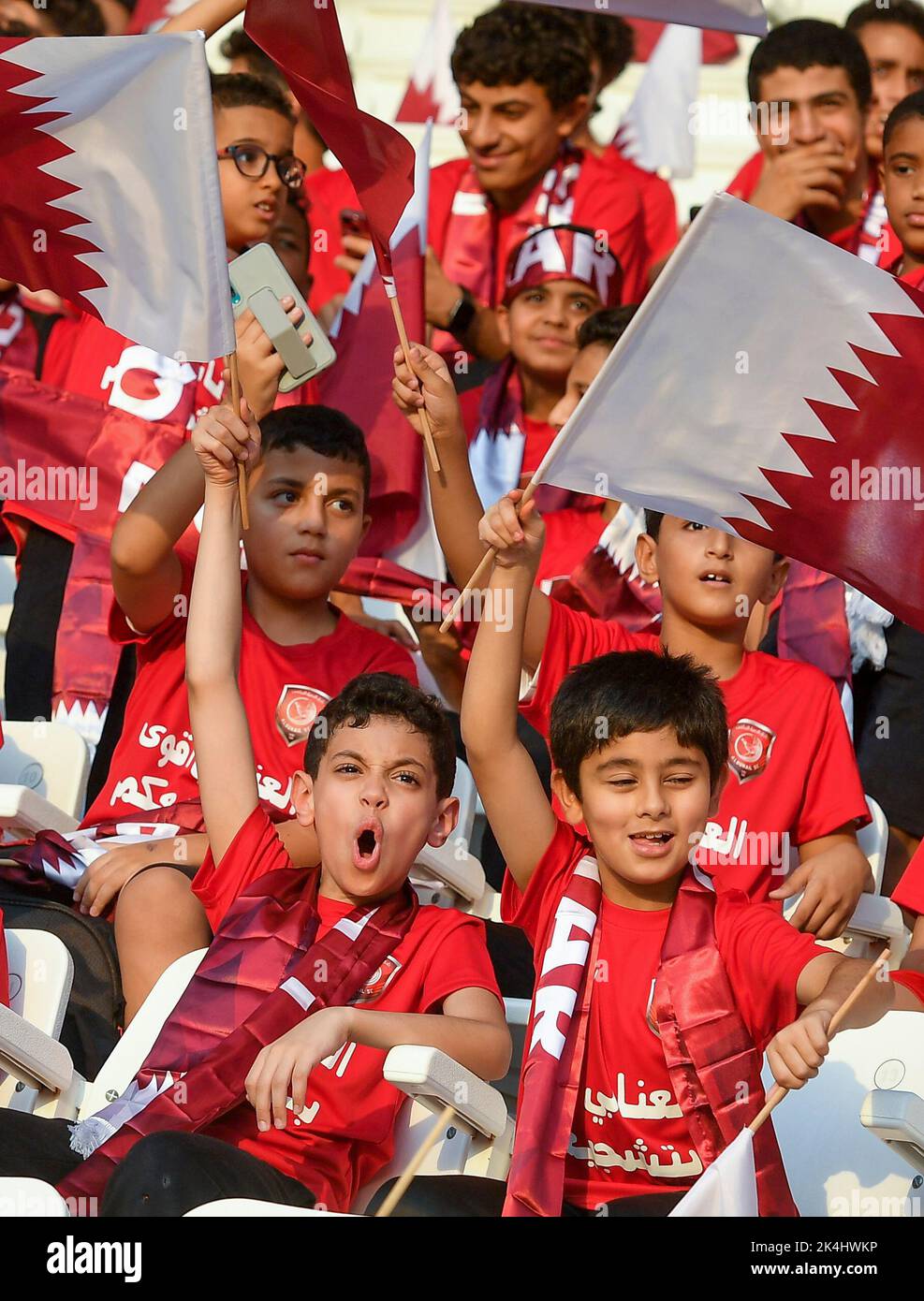 Doha, Qatar. 2nd Oct, 2022. Children cheer during a public training ...