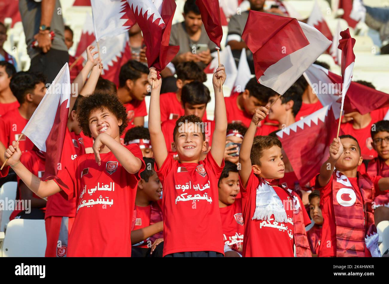 Doha, Qatar. 2nd Oct, 2022. Children cheer during a public training ...