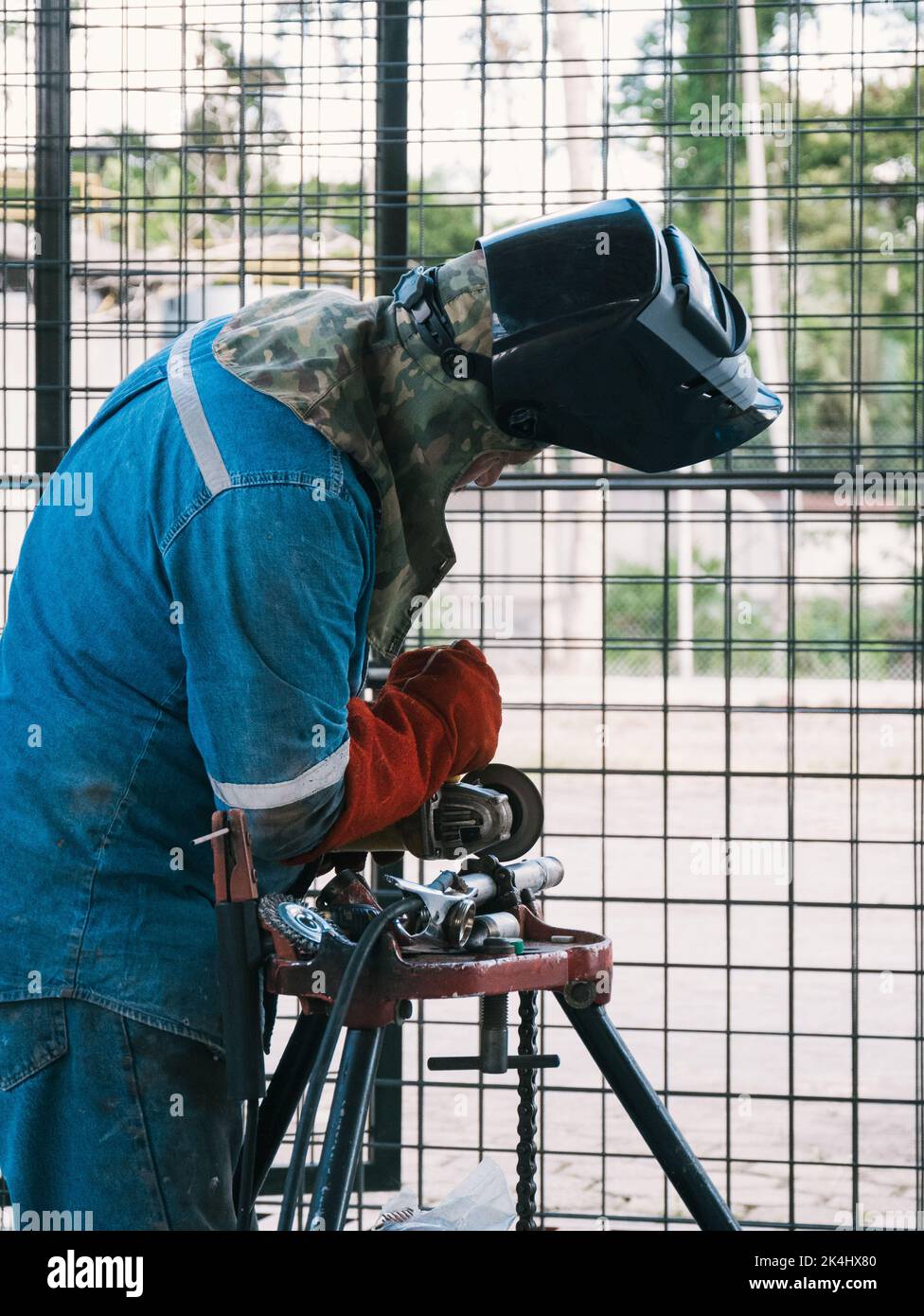 Iron soldering, Man working on iron soldering, welding sparks, men ...