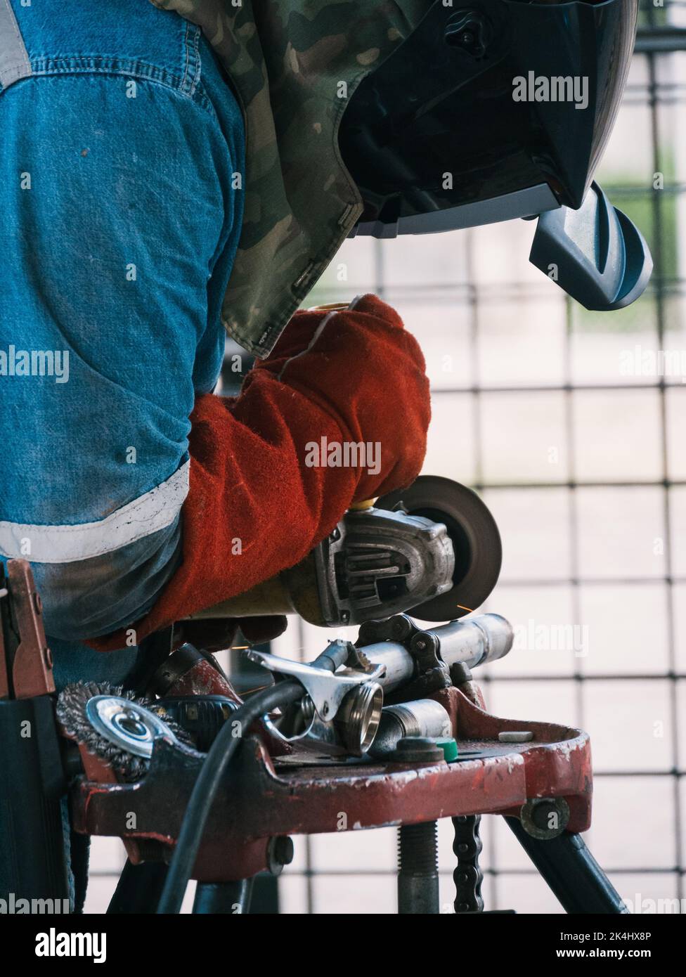 Iron soldering, Man working on iron soldering, welding sparks, men ...