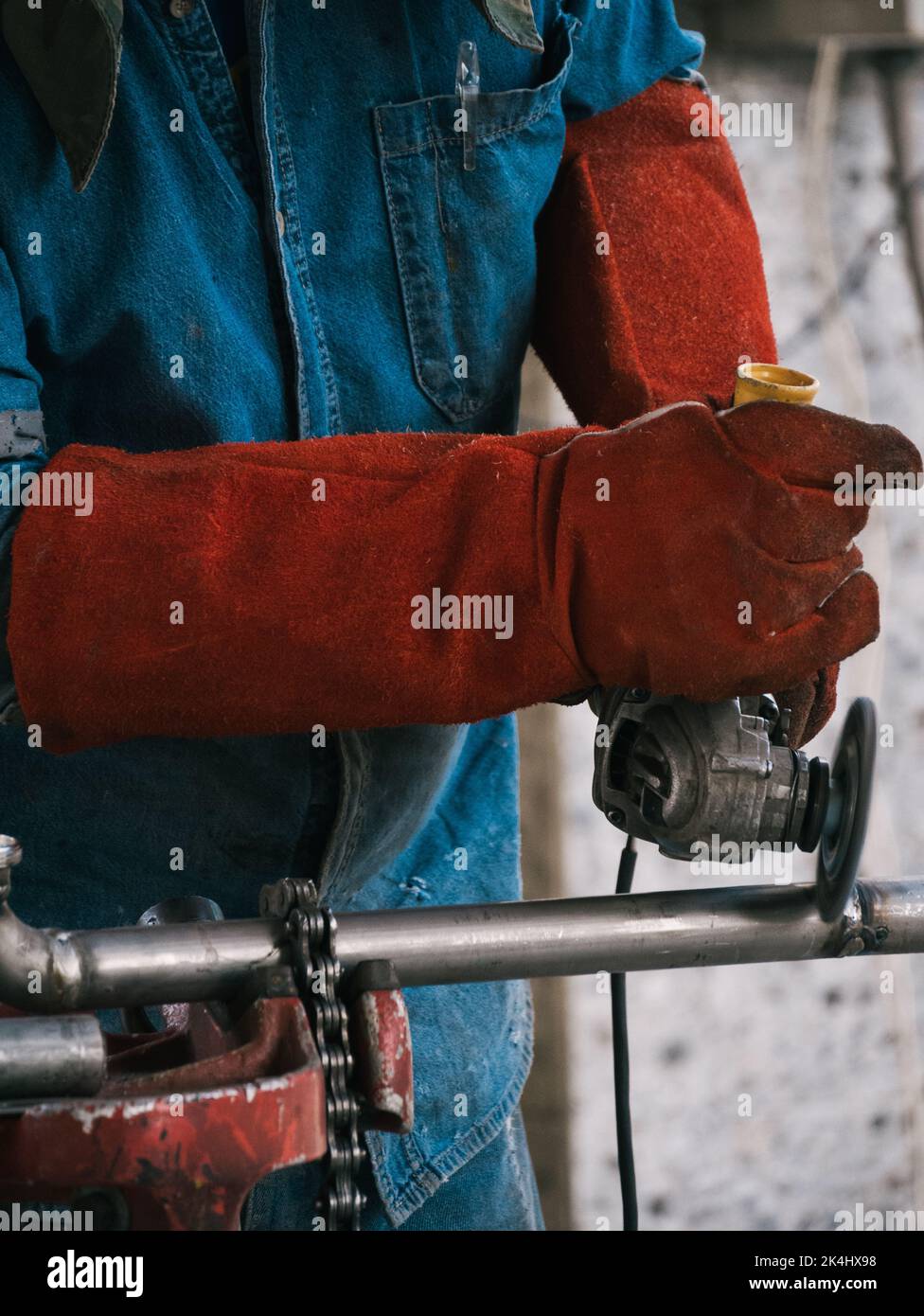 Iron soldering, Man working on iron soldering, welding sparks, men ...