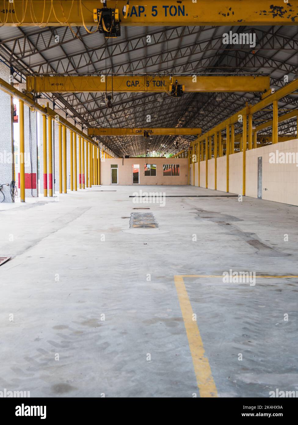 Electric crane hook handling transport factory. old iron Stock Photo ...