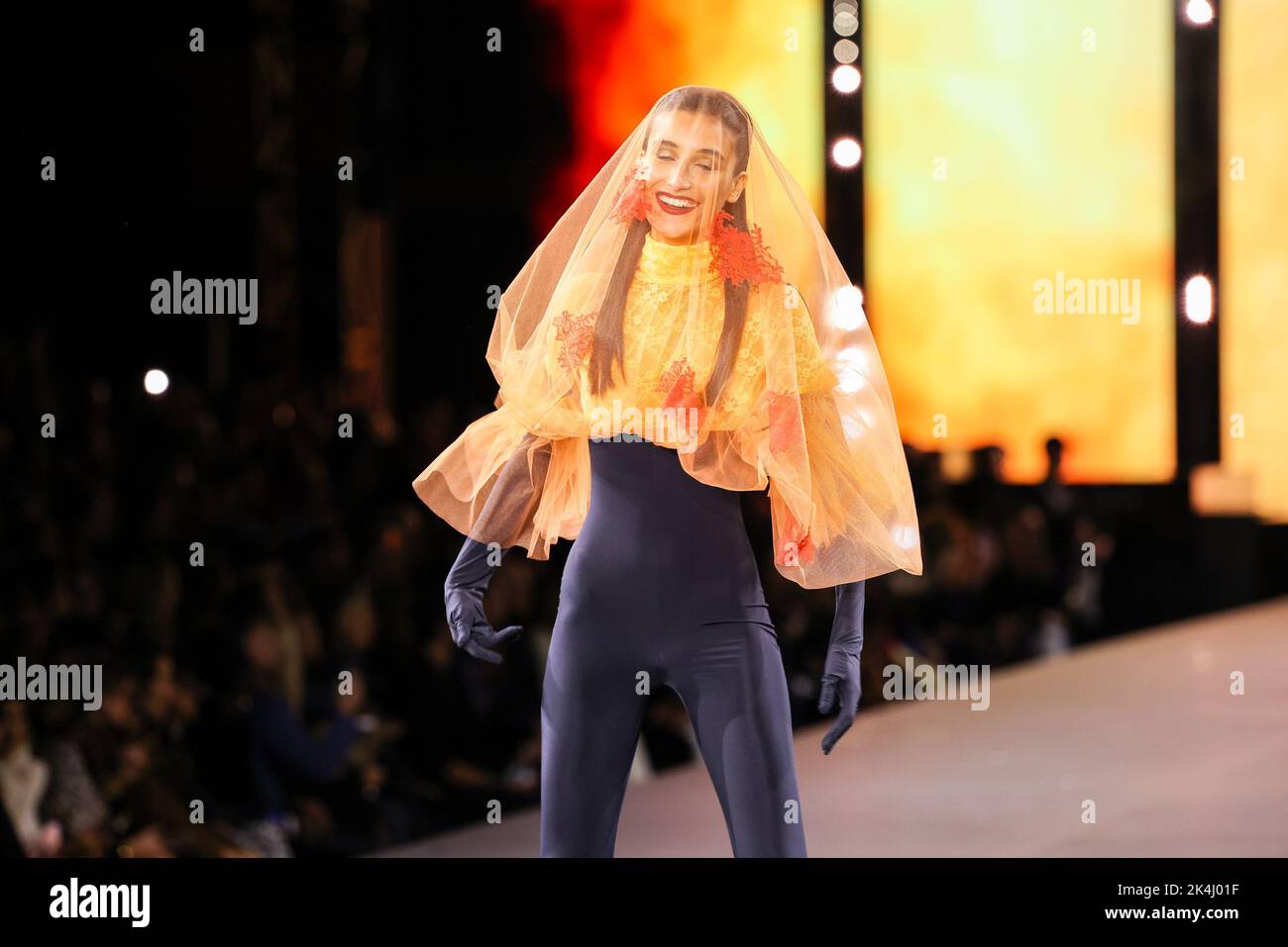 A model walks the runway of the Le Défilé L'Oréal during Paris Fashion ...