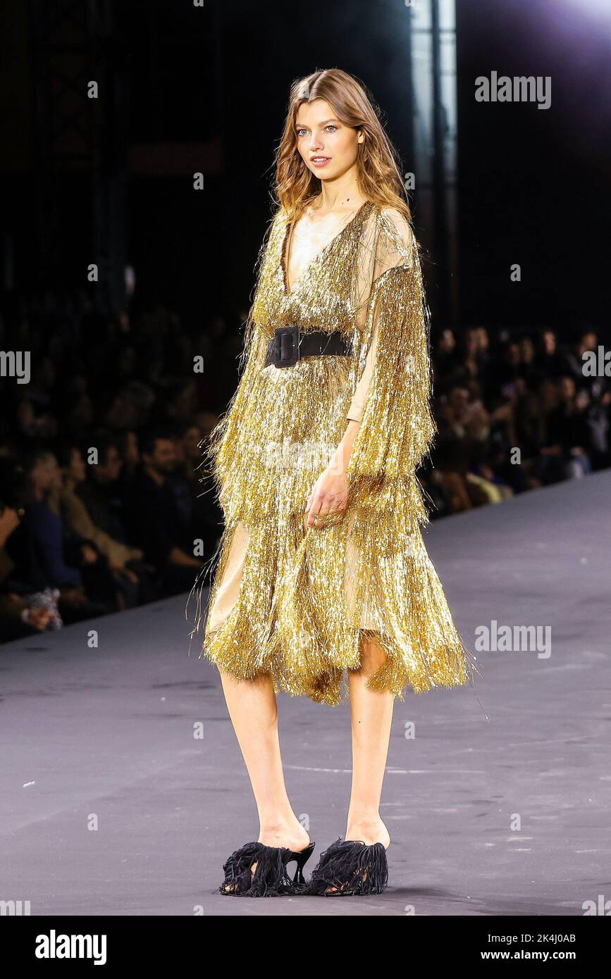 A model walks the runway of the Le Défilé L'Oréal during Paris Fashion ...