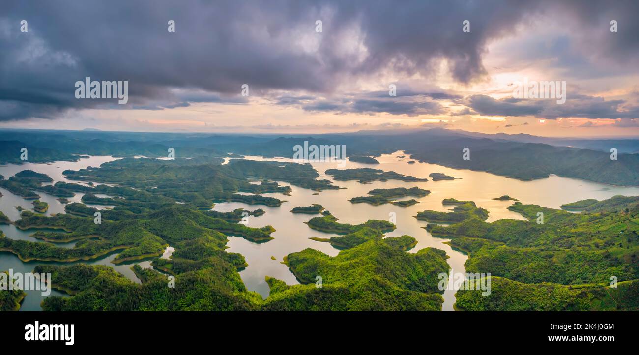 Sunset Ta Dung hydroelectric lake seen from above. The lake provides ...