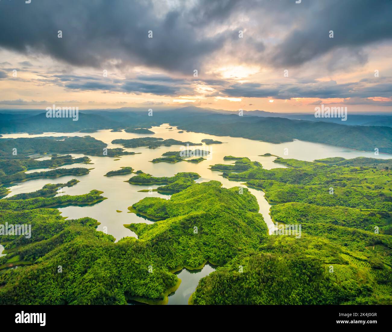 Sunset Ta Dung hydroelectric lake seen from above. The lake provides ...