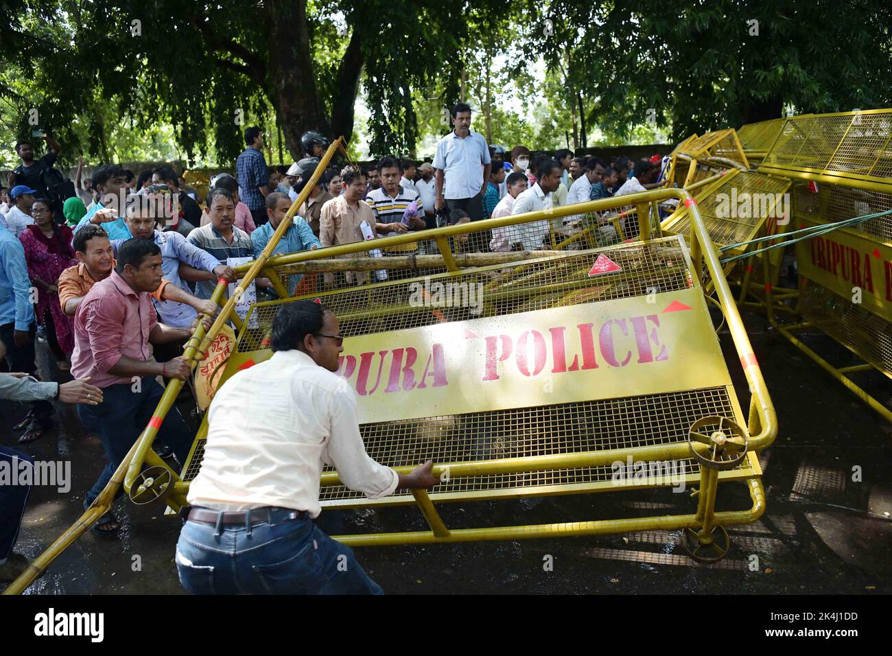 Security attempt to stop activists from crossing the barricades during ...