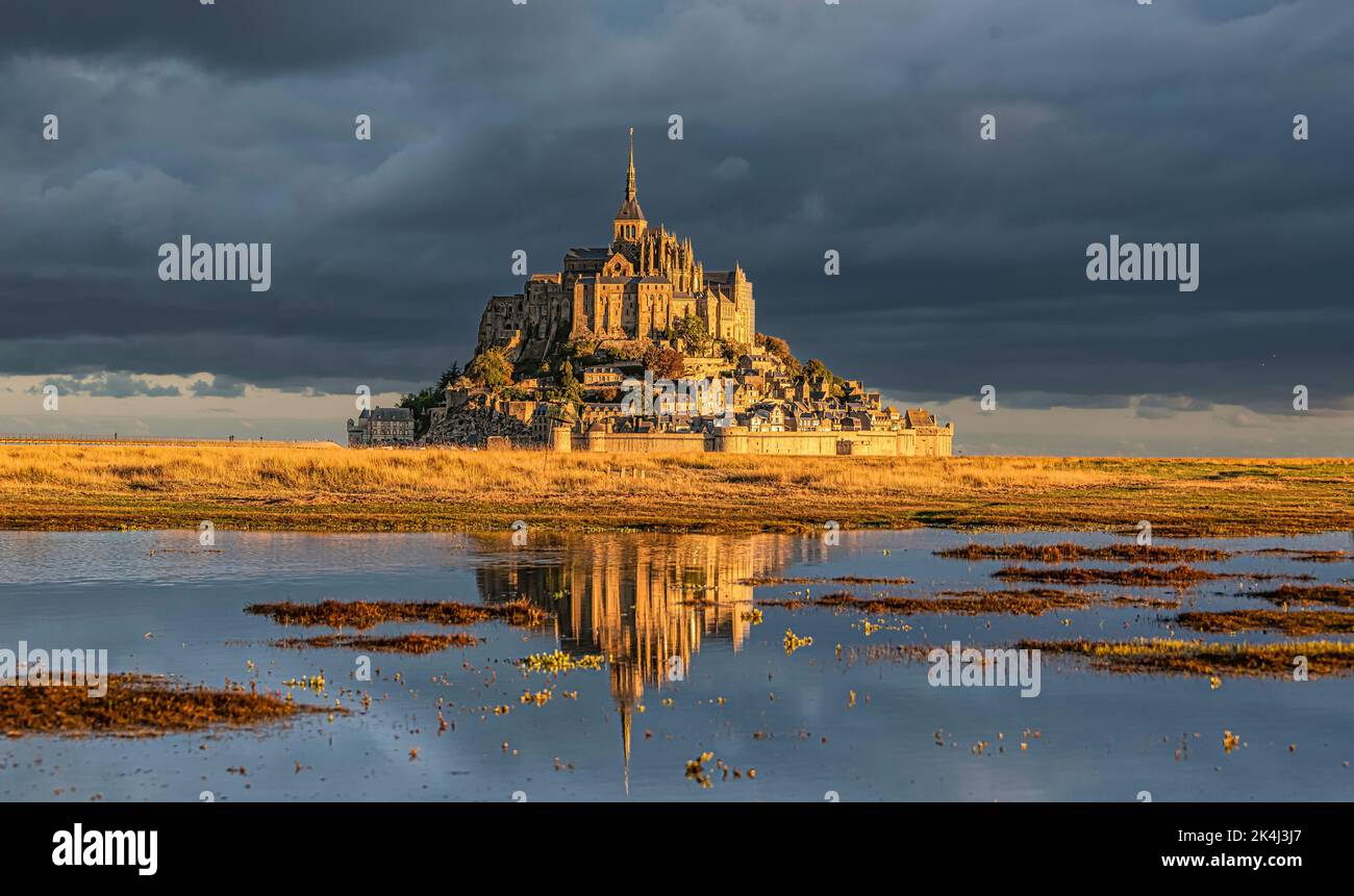 Breathtaking sunrise at the famous Le Mont Saint-Michel tidal island ...