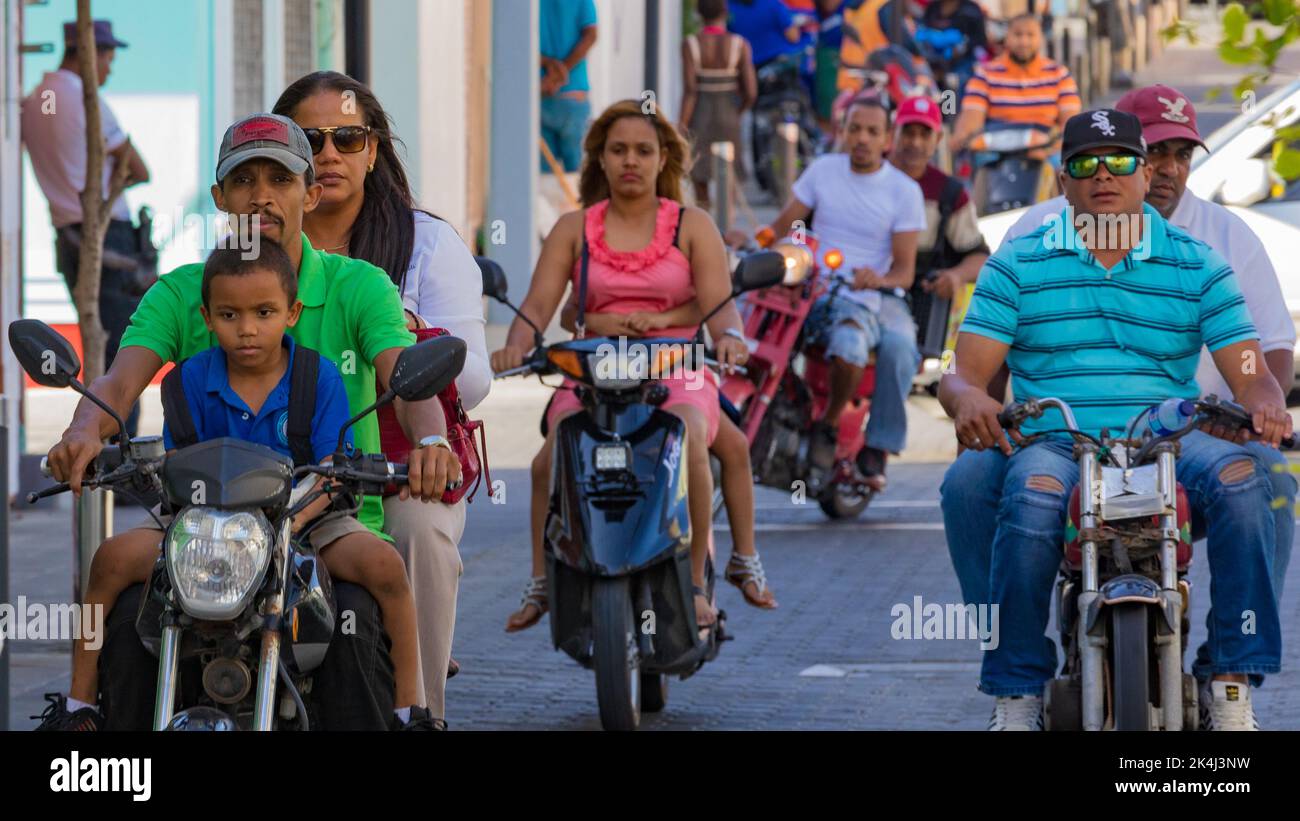 Puerto Plata, Puerto Plata, May 22, 2018: People riding motorbikes for ...