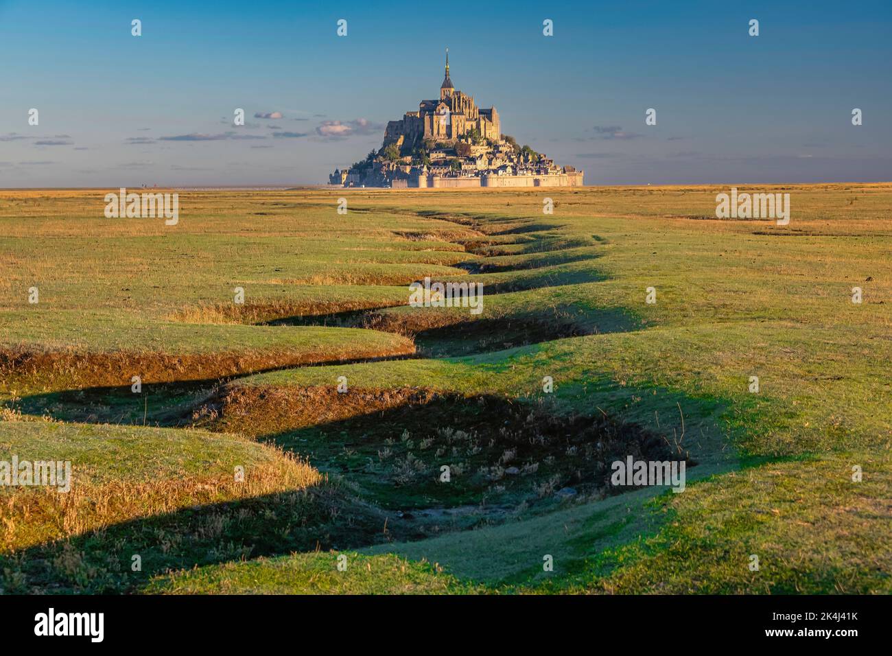 Breathtaking sunrise at the famous Le Mont Saint-Michel tidal island ...