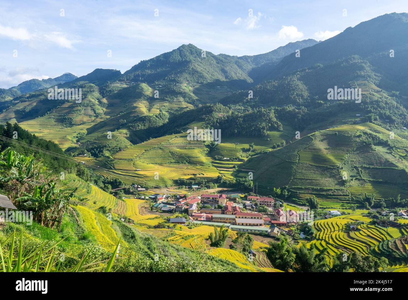 Aerial view of golden rice terraces at Mu cang chai town near Sapa city ...