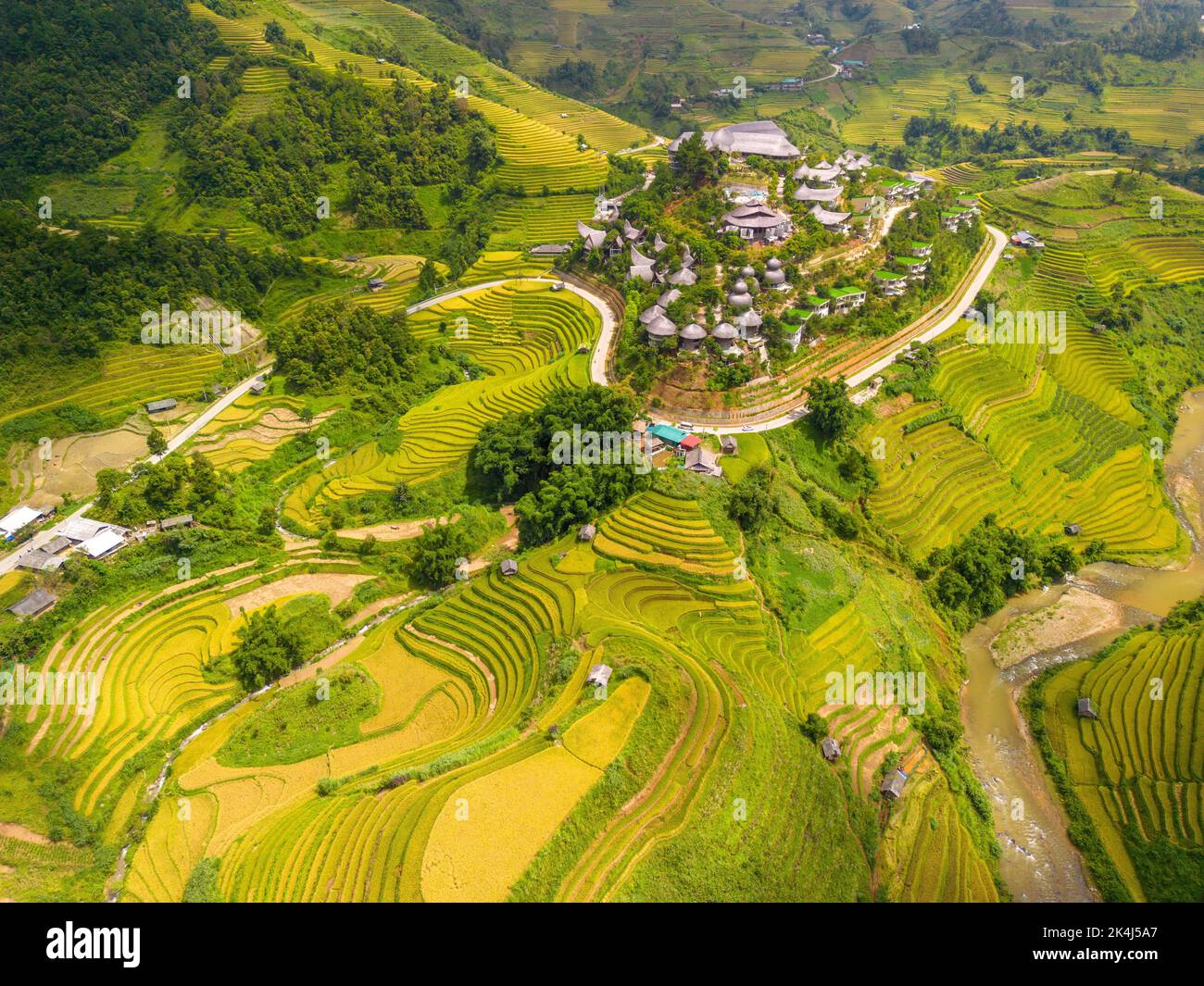 Aerial view of golden rice terraces at Mu cang chai town near Sapa city ...