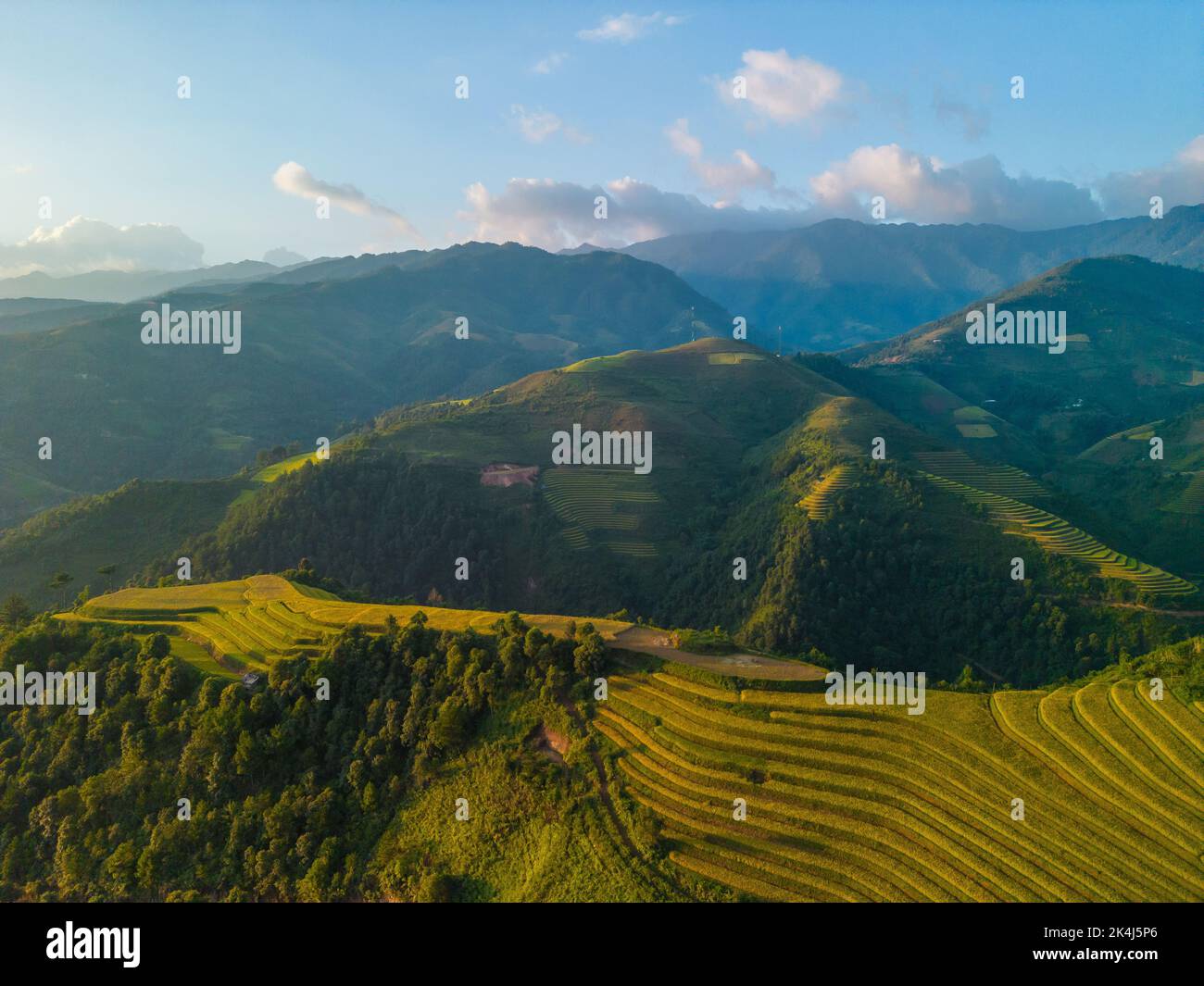 Aerial view of golden rice terraces at Mu cang chai town near Sapa city ...
