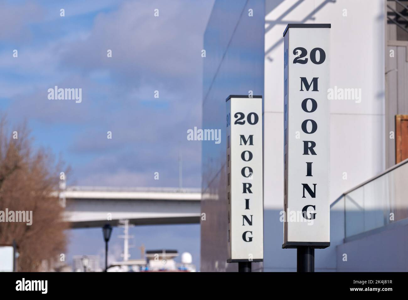 Mooring pier signs in city embankment, identification signs with ...