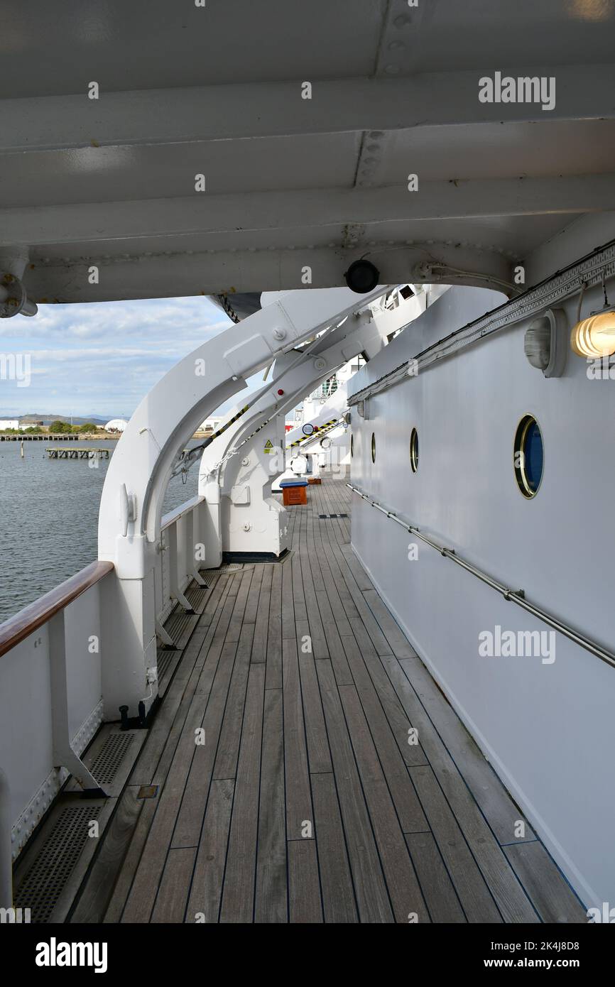 A vertical shot of a teak deck hallway in a ship Stock Photo - Alamy