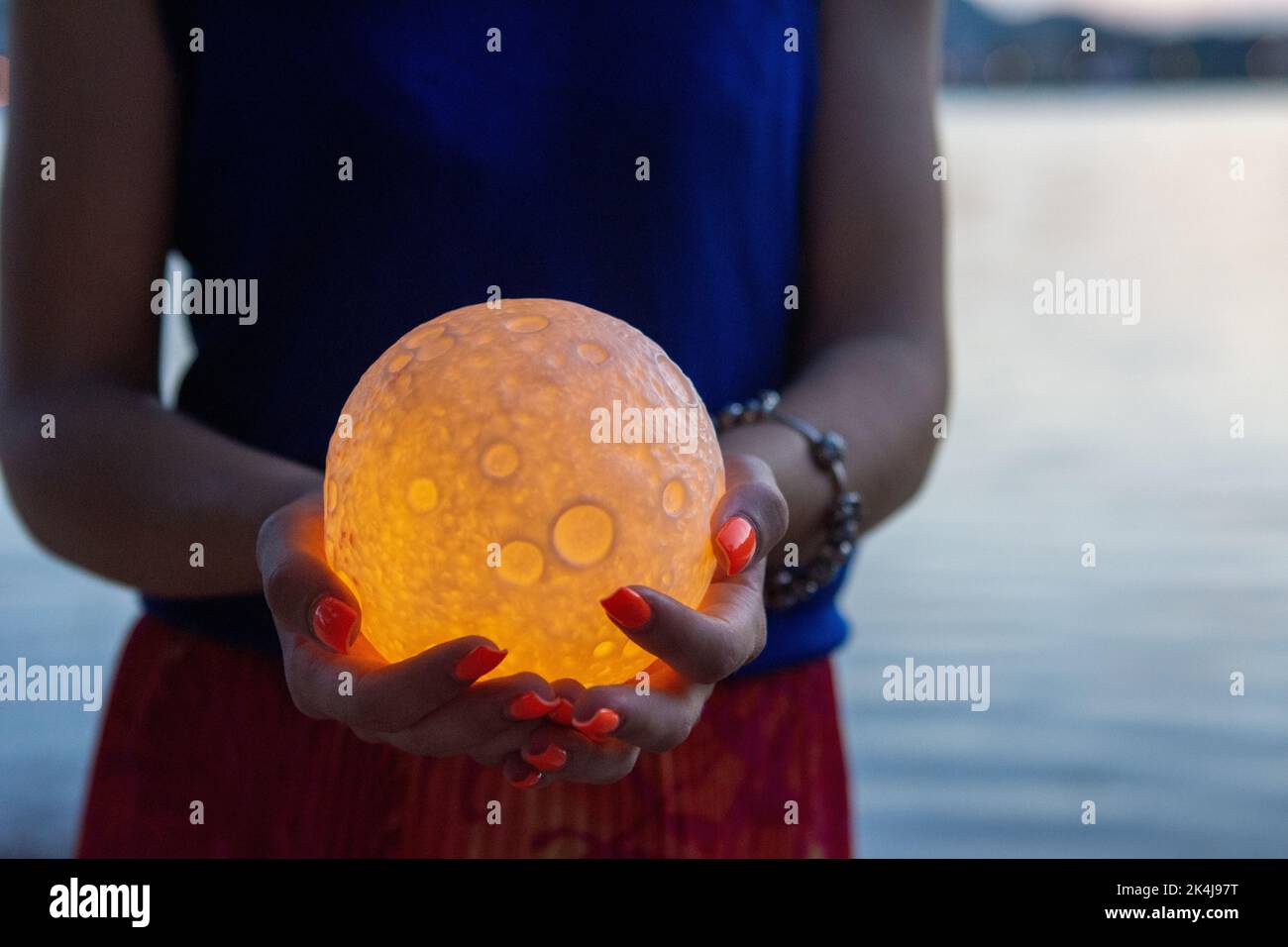Close up moon in woman's hands. Astrology concept Stock Photo - Alamy