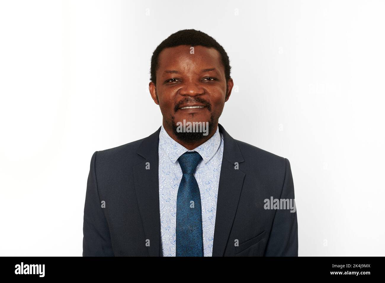 Smiling african american black man in business suit isolated on white ...