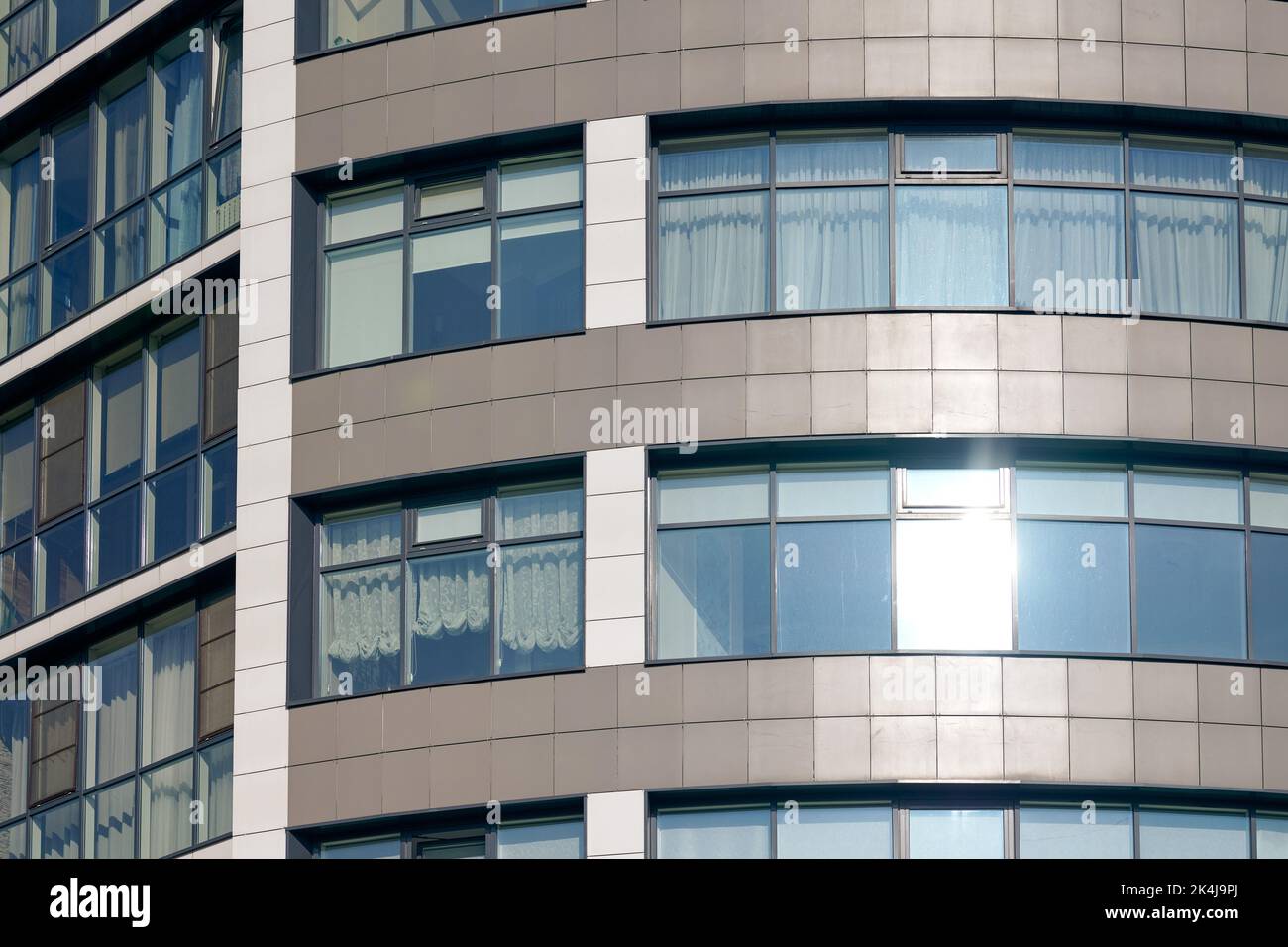 Close up view to office skyscraper windows, high business building ...