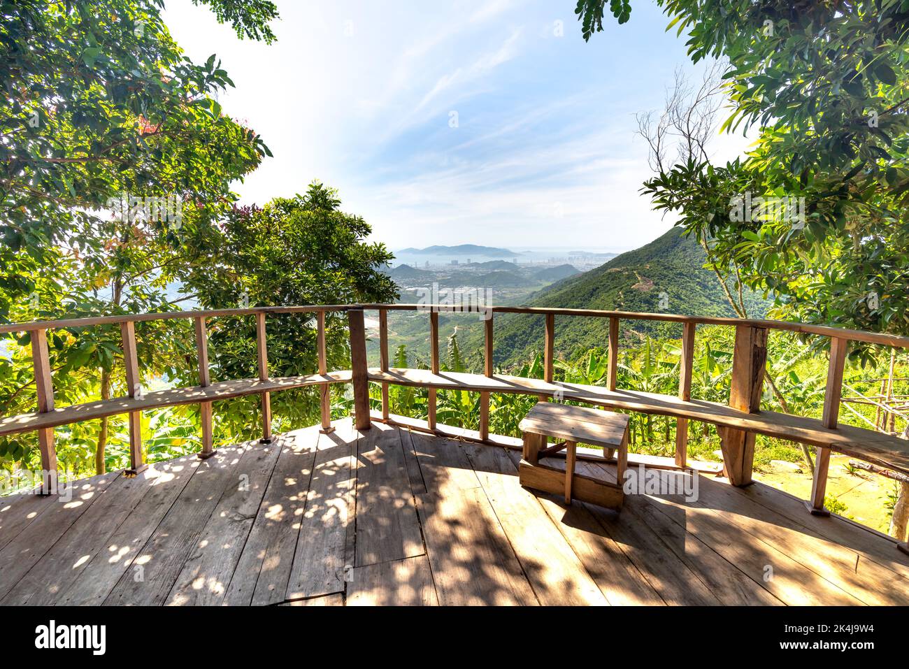 Simple little house with wooden balcony overlooking the valley. In the ...