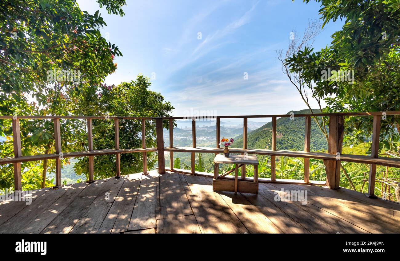 Simple little house with wooden balcony overlooking the valley. In the ...
