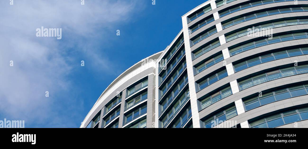 Office skyscraper high business building on blue sky background ...