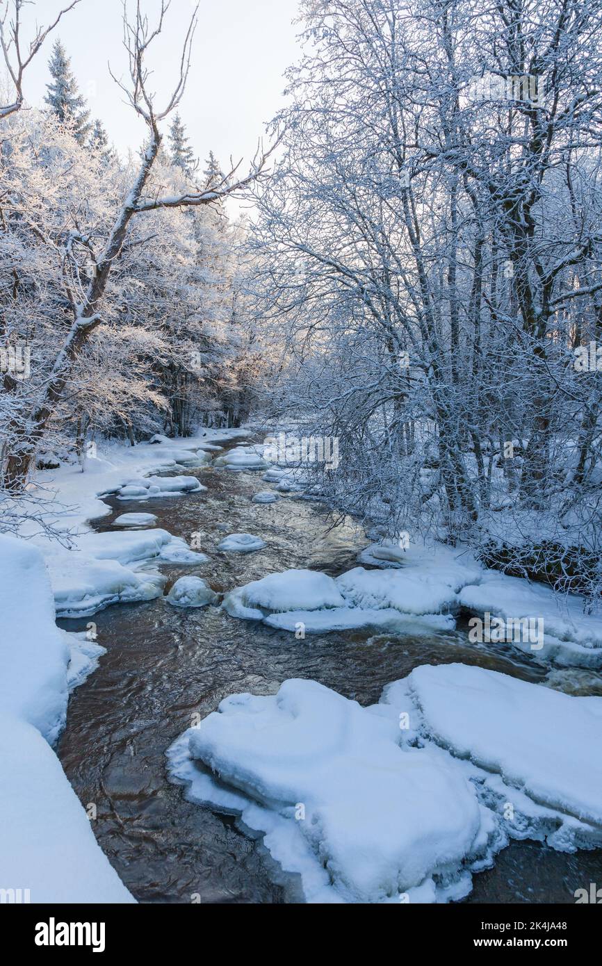 River in snowy forest landscape Stock Photo - Alamy